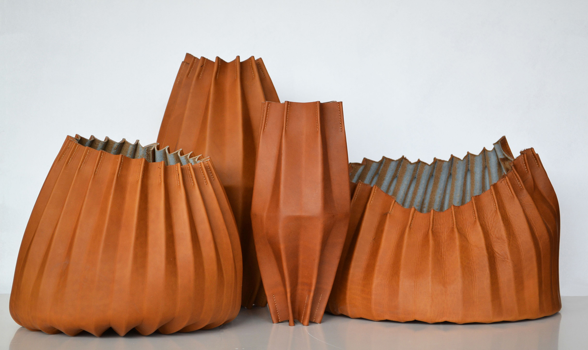 Fluting, grooves, ridges and creases make the creation twirl