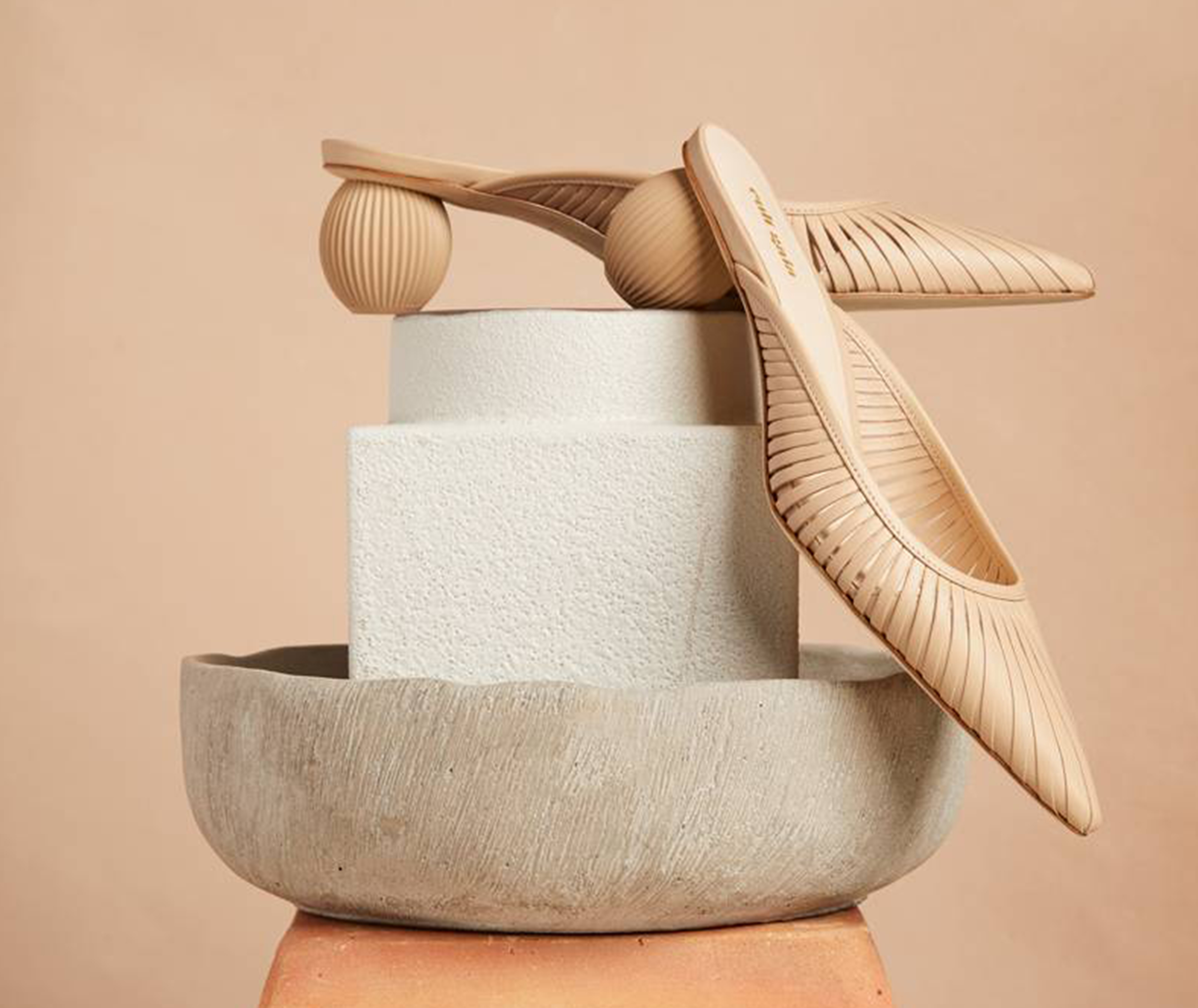 Fluting, grooves, ridges and creases make the creation twirl