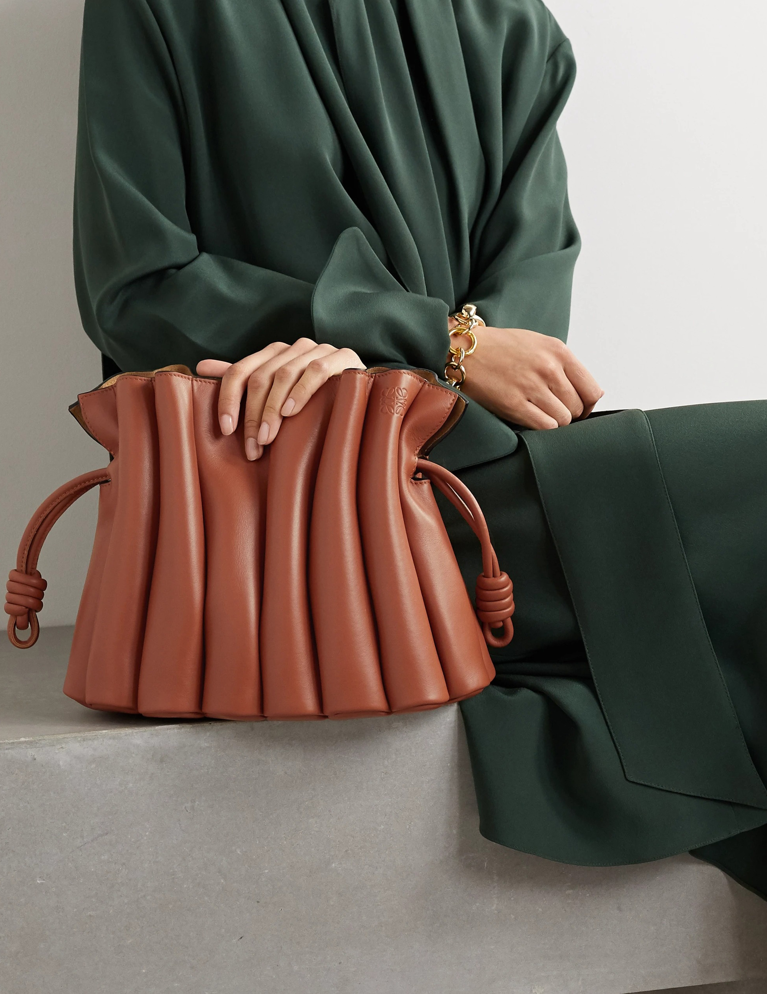 Fluting, grooves, ridges and creases make the creation twirl